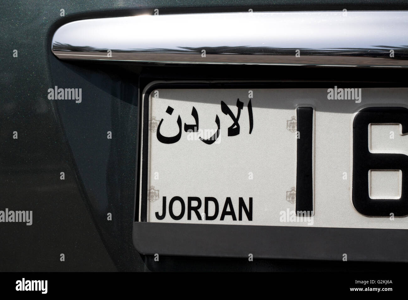 white jordanian licence plate on a shiny black car Stock Photo - Alamy
