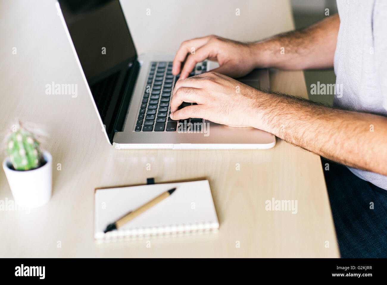 Man working at computer Stock Photo - Alamy