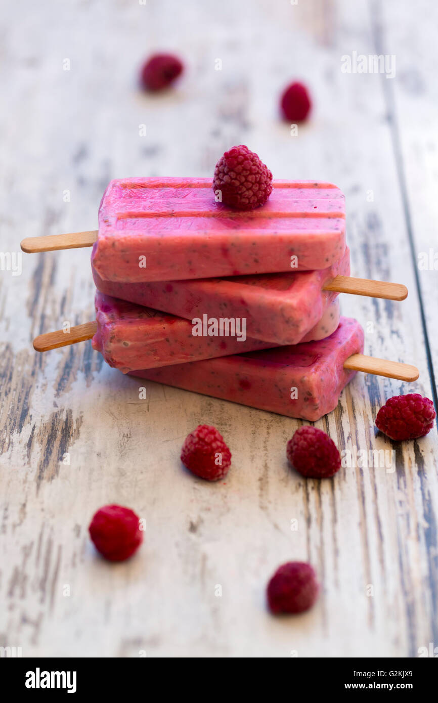 Stack of homemade raspberry ice lollies Stock Photo - Alamy