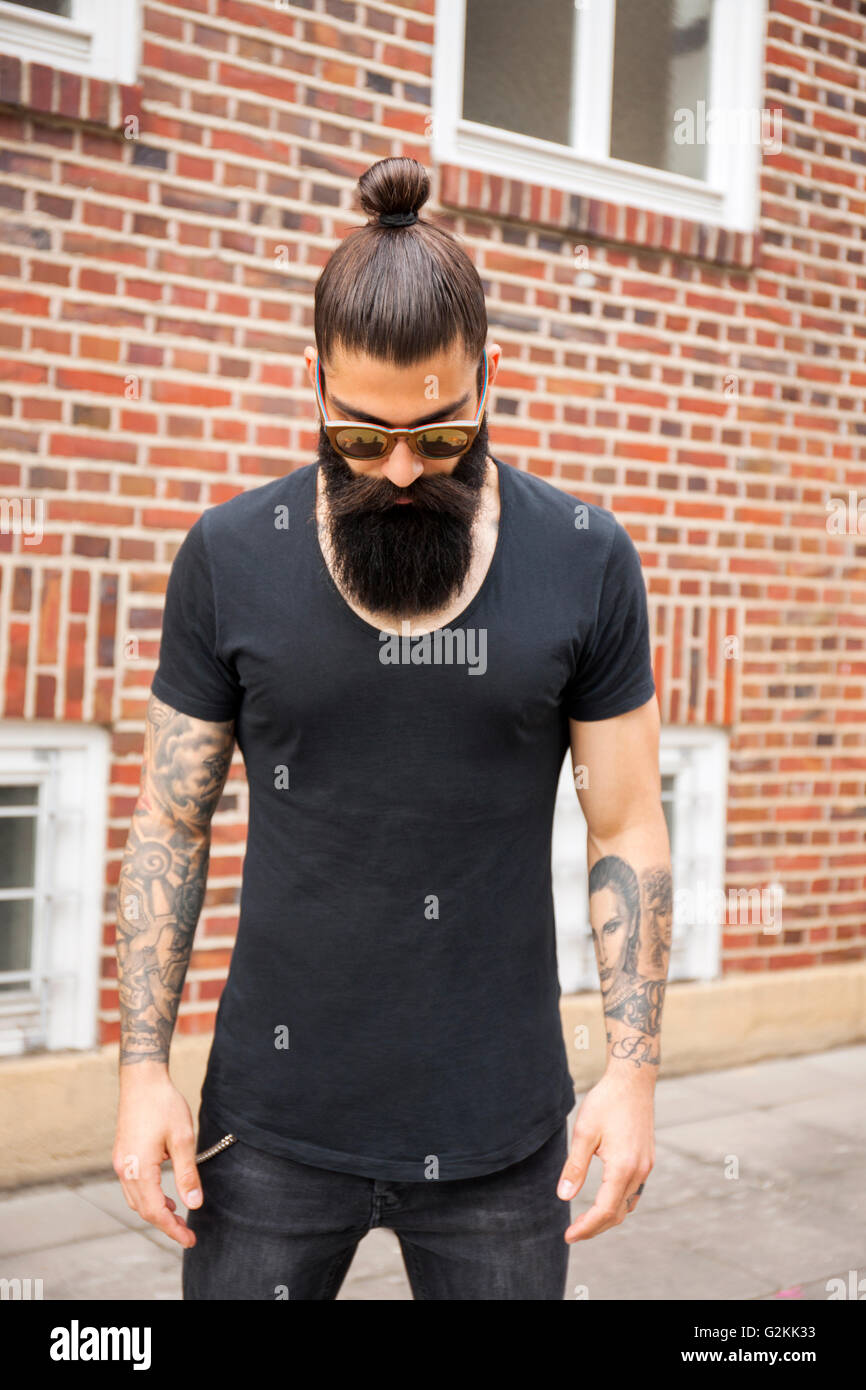 Bun tatooed arms hi-res stock photography and images - Alamy