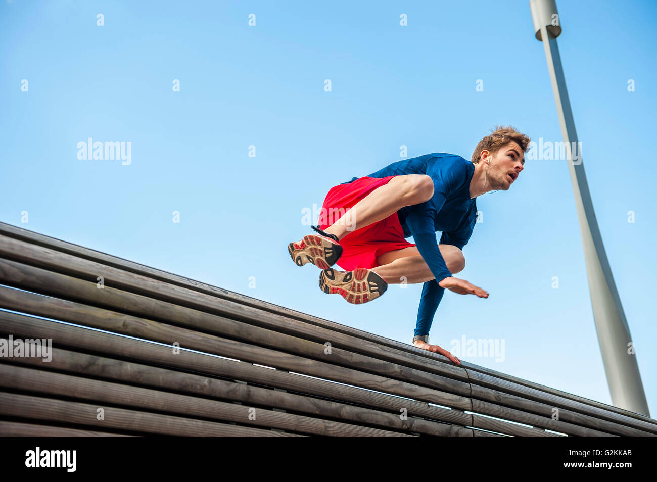 Man jumping over barrier hi-res stock photography and images - Alamy