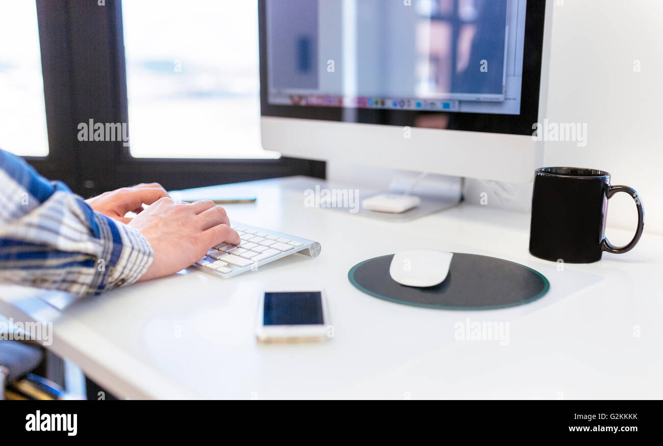 Close-up of man using computer keyboard in office Stock Photo - Alamy Close-up of man using computer keyboard in office Stock Photo - Alamy