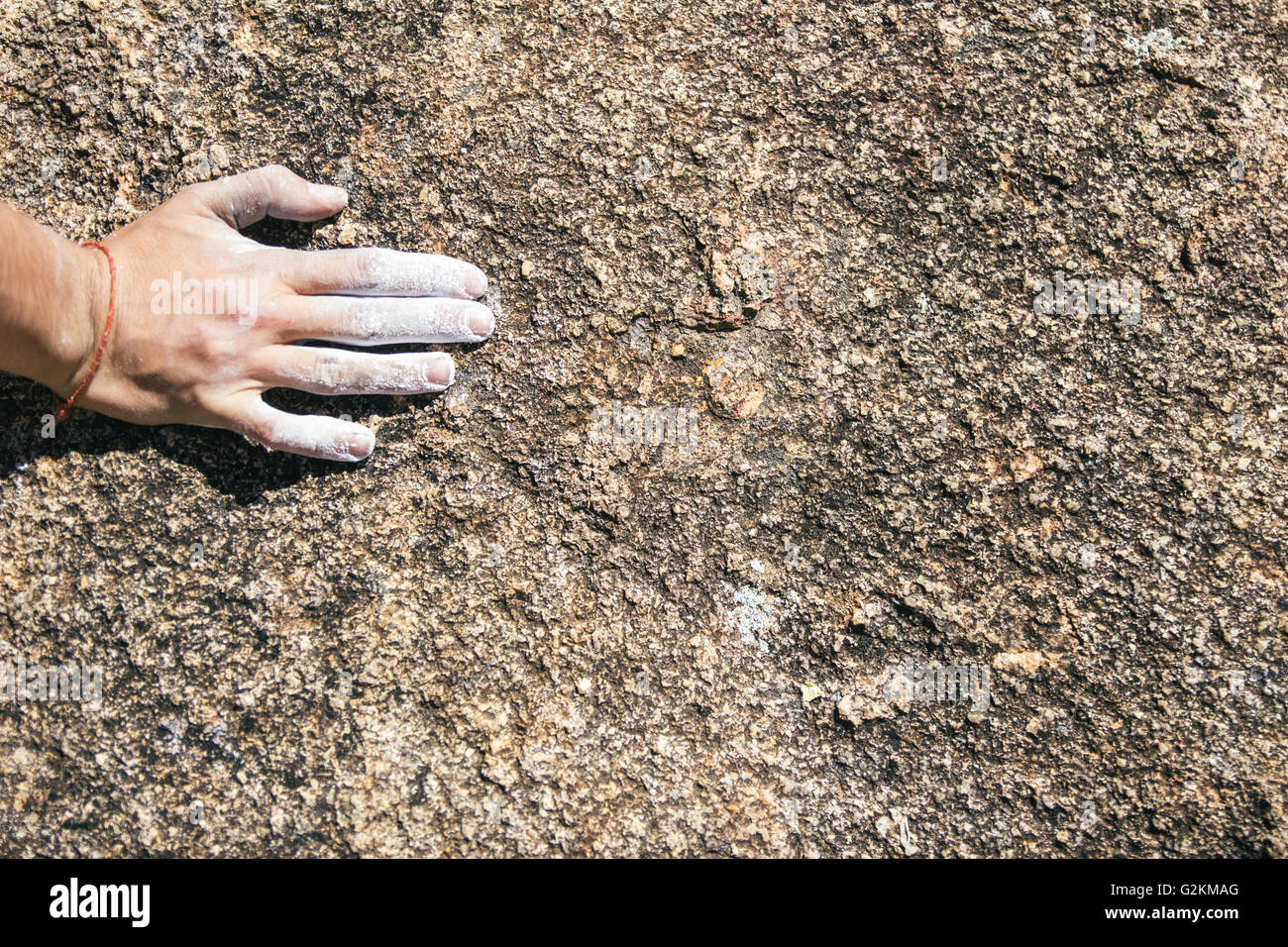 Hands with powder chalk magnesium on the rock Stock Photo - Alamy