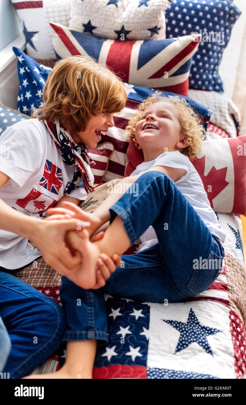 Two little brothers playing together at home Stock Photo - Alamy