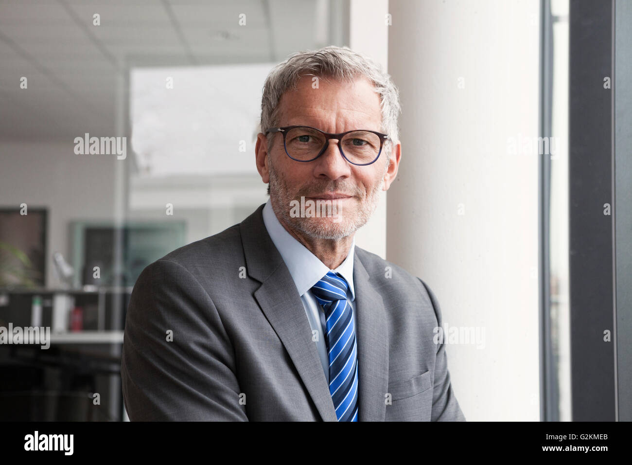 Successful manager in office, portrait Stock Photo - Alamy