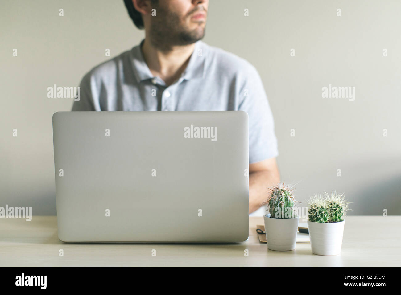 Man working at computer Stock Photo - Alamy