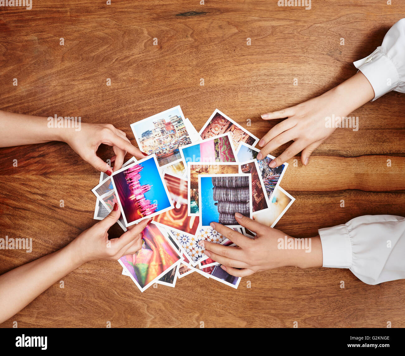 Hands with photo prints Stock Photo - Alamy
