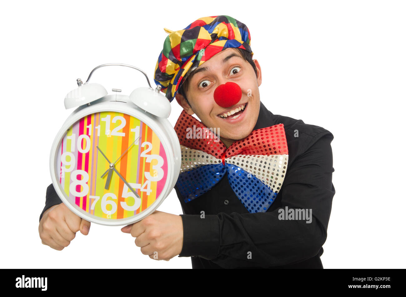 Funny clown with clock isolated on white Stock Photo - Alamy