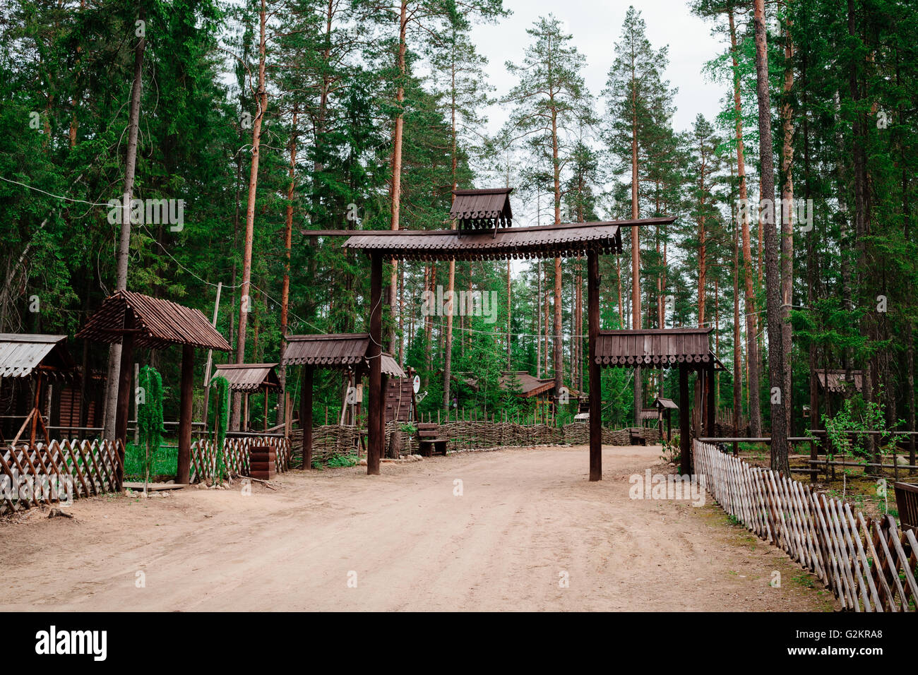 Wooden arches and fences at entry into the village Stock Photo - Alamy
