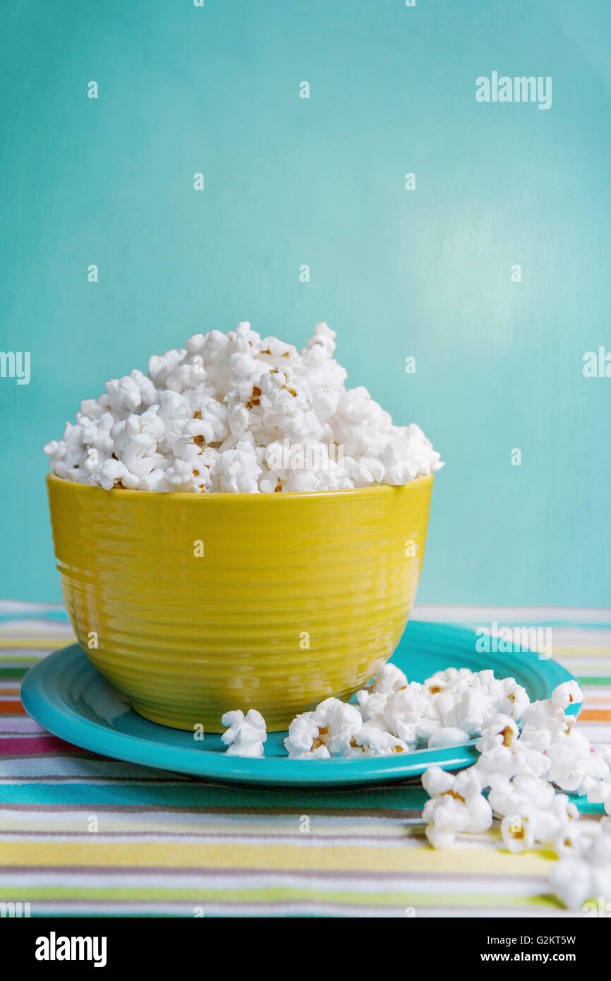 Popcorn in Yellow Bowl Stock Photo - Alamy