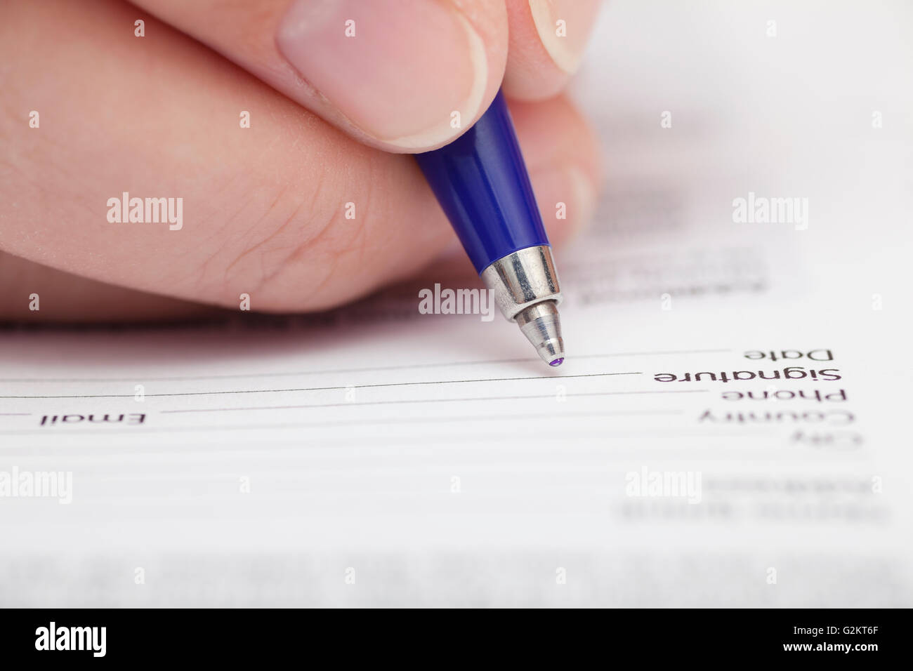 Person filling personal data. Closeup Stock Photo - Alamy