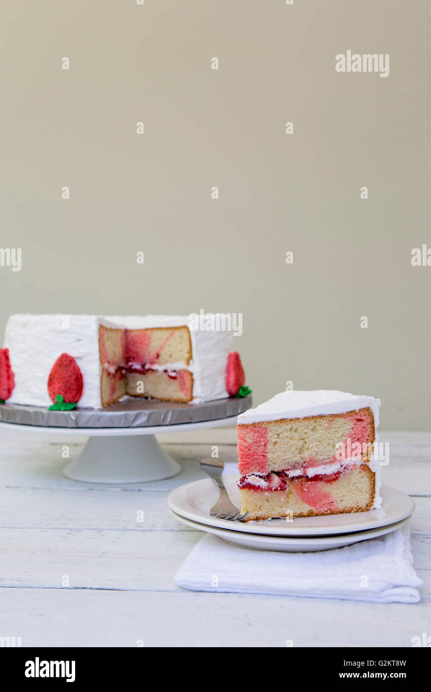 Strawberry Cake with Vanilla Icing Stock Photo - Alamy