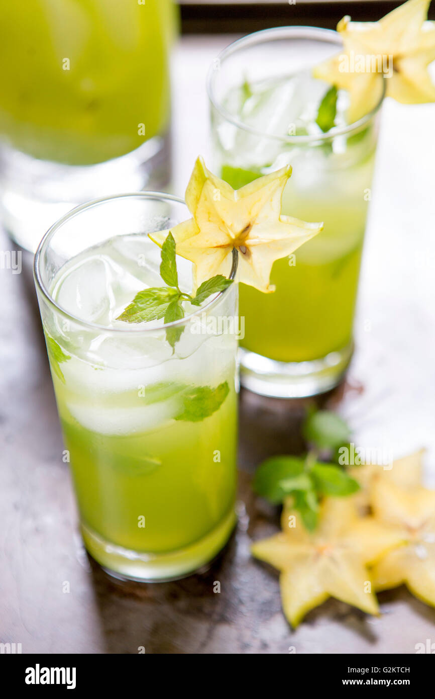 Cocktail with Star Fruit Stock Photo - Alamy