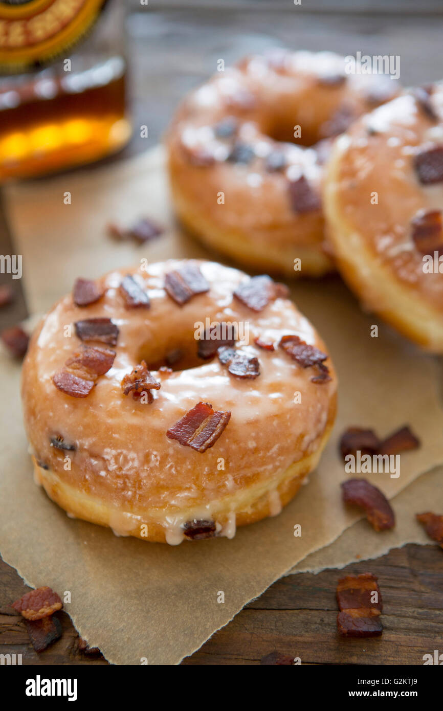 Glazed Donuts with Maple Bacon Bits Stock Photo - Alamy