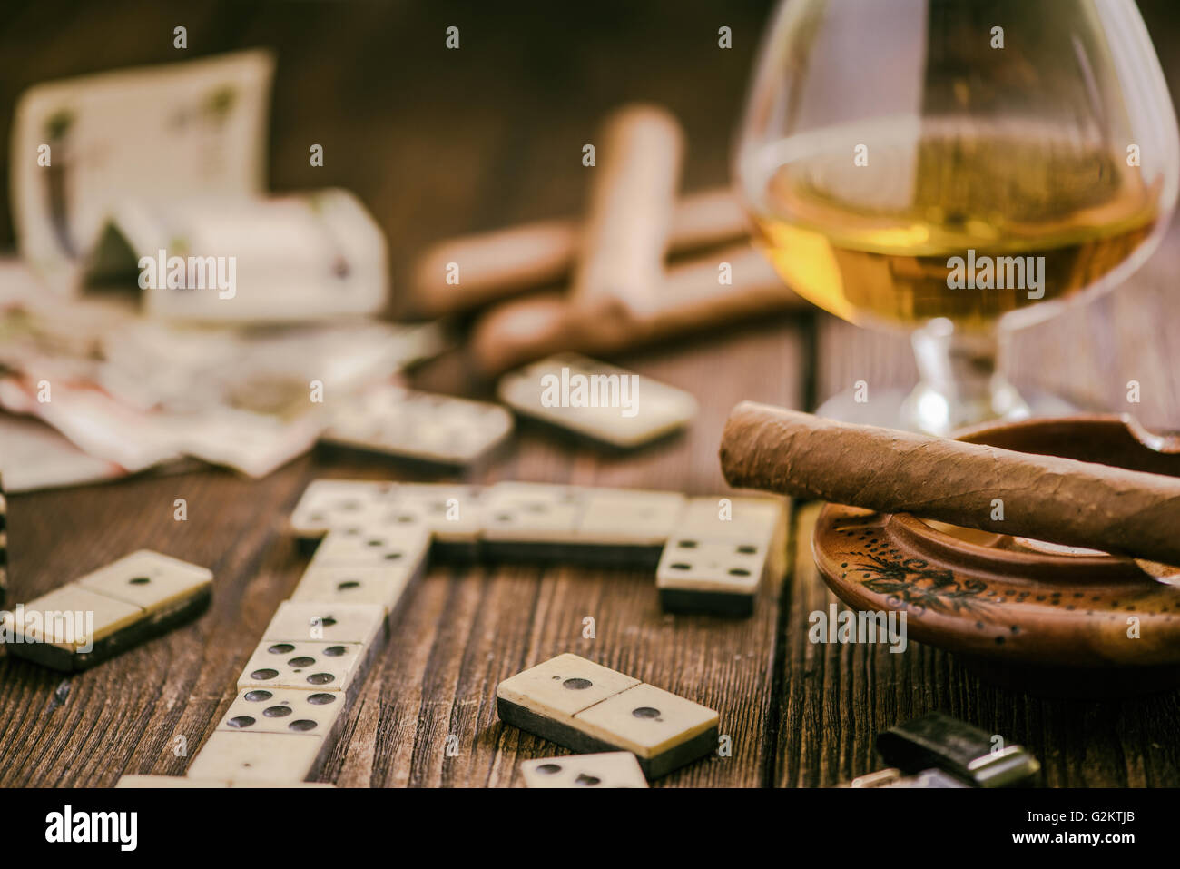 cuban traditional domino game, cigar and cognac Stock Photo - Alamy
