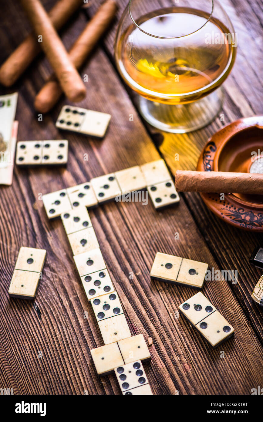 playing domino for money with cigars, cuba traditional game Stock Photo ...