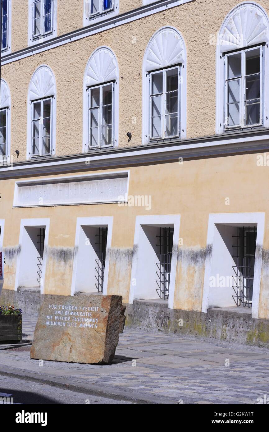A memorial stone made out of granite from Mauthausen stands in front of ...