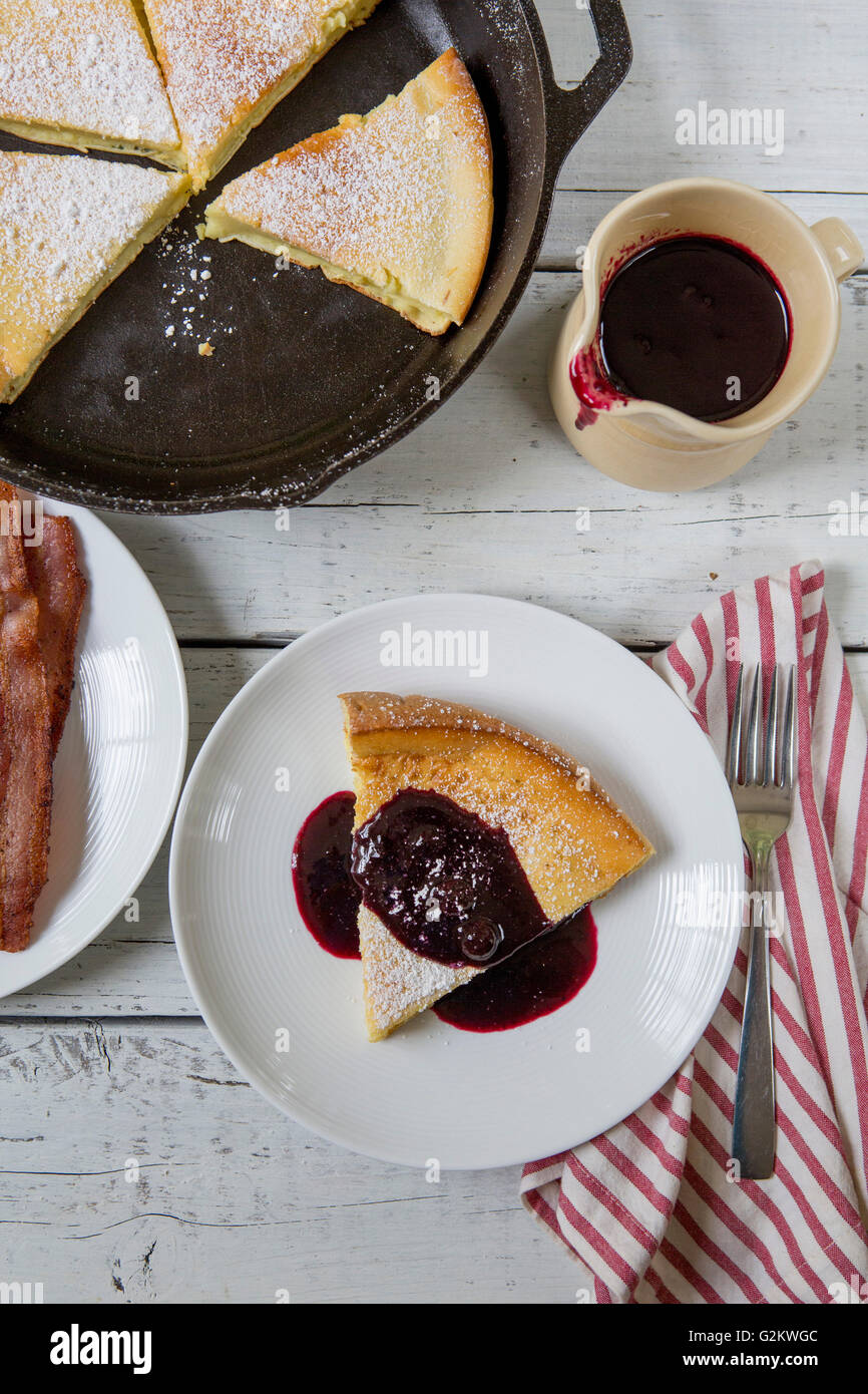 Dutch Pancake with Blueberry Syrup, High Angle View Stock Photo - Alamy