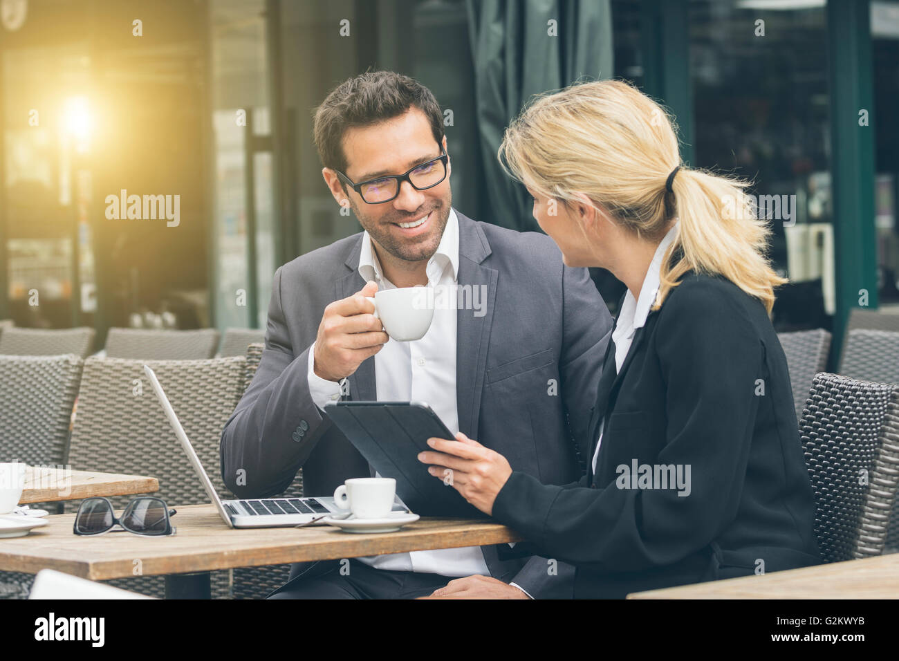 Business people having a coffee break Stock Photo - Alamy