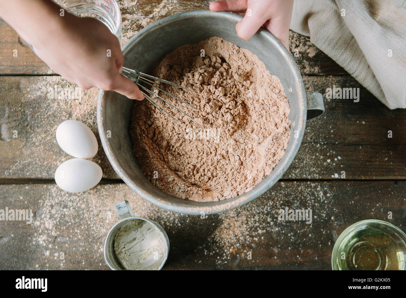 Ingredients Being Whisked in with Cake Mix, High Angle View Stock Photo ...