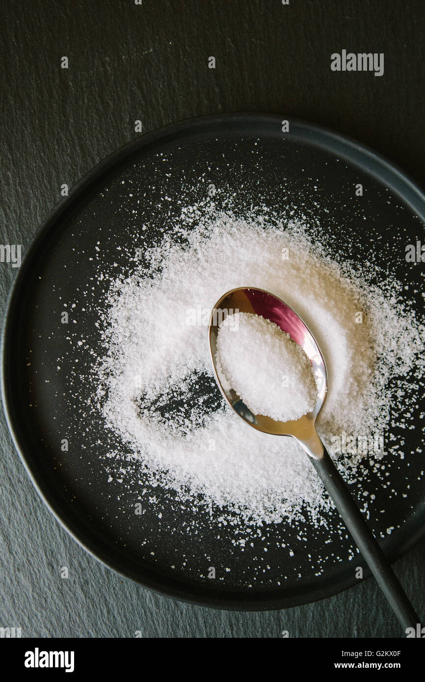 Salt and Spoon in Dish, High Angle View Stock Photo - Alamy