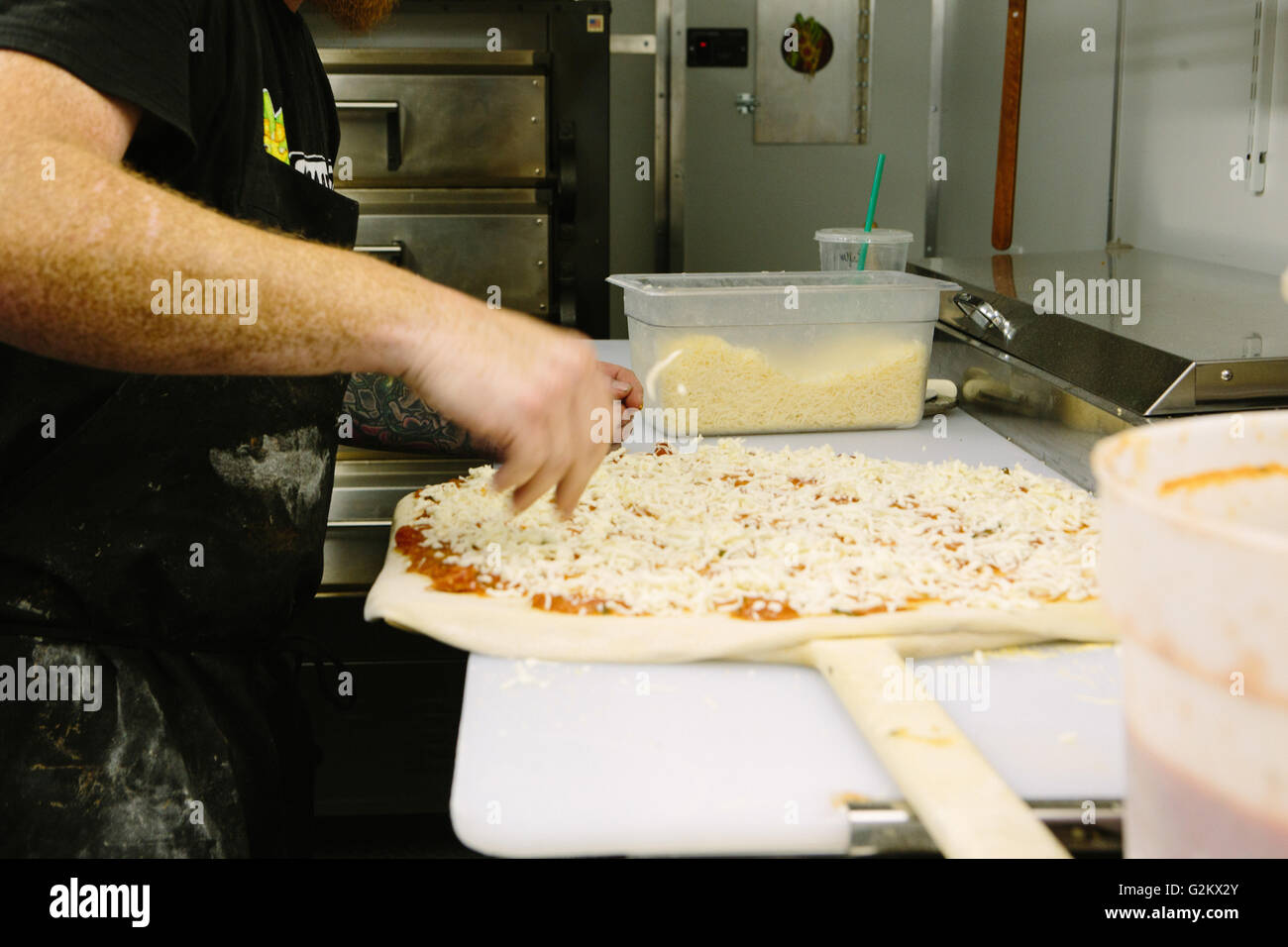 Man making dough for pizza hi-res stock photography and images - Alamy