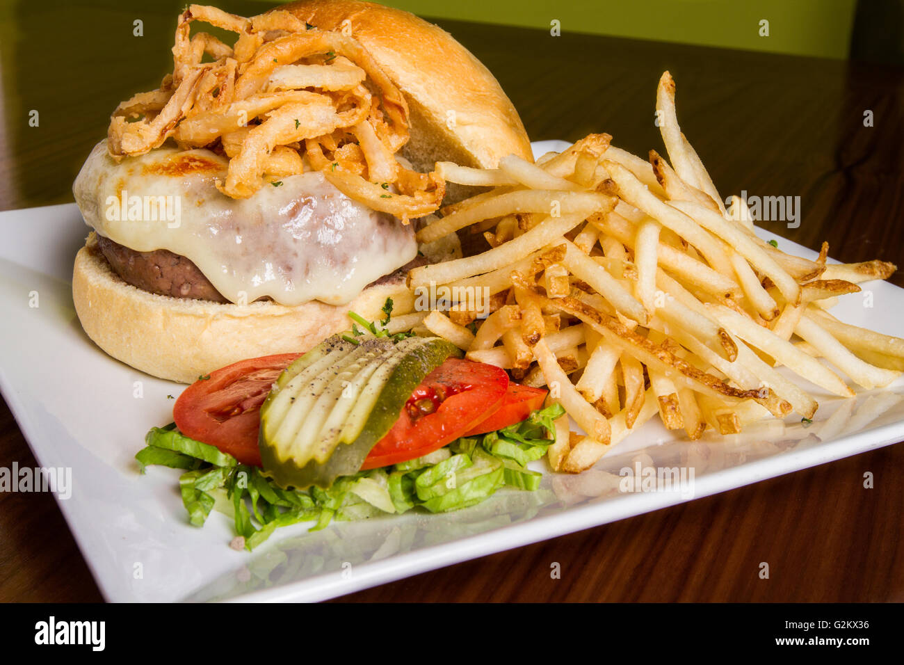 Cheeseburger and French Fries Stock Photo - Alamy