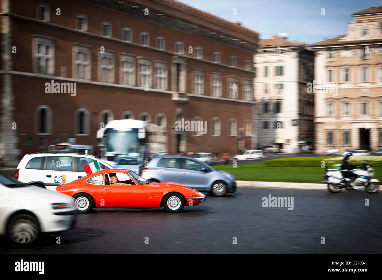 Race Car Passing Through Traffic, Rome Italy Stock Photo - Alamy