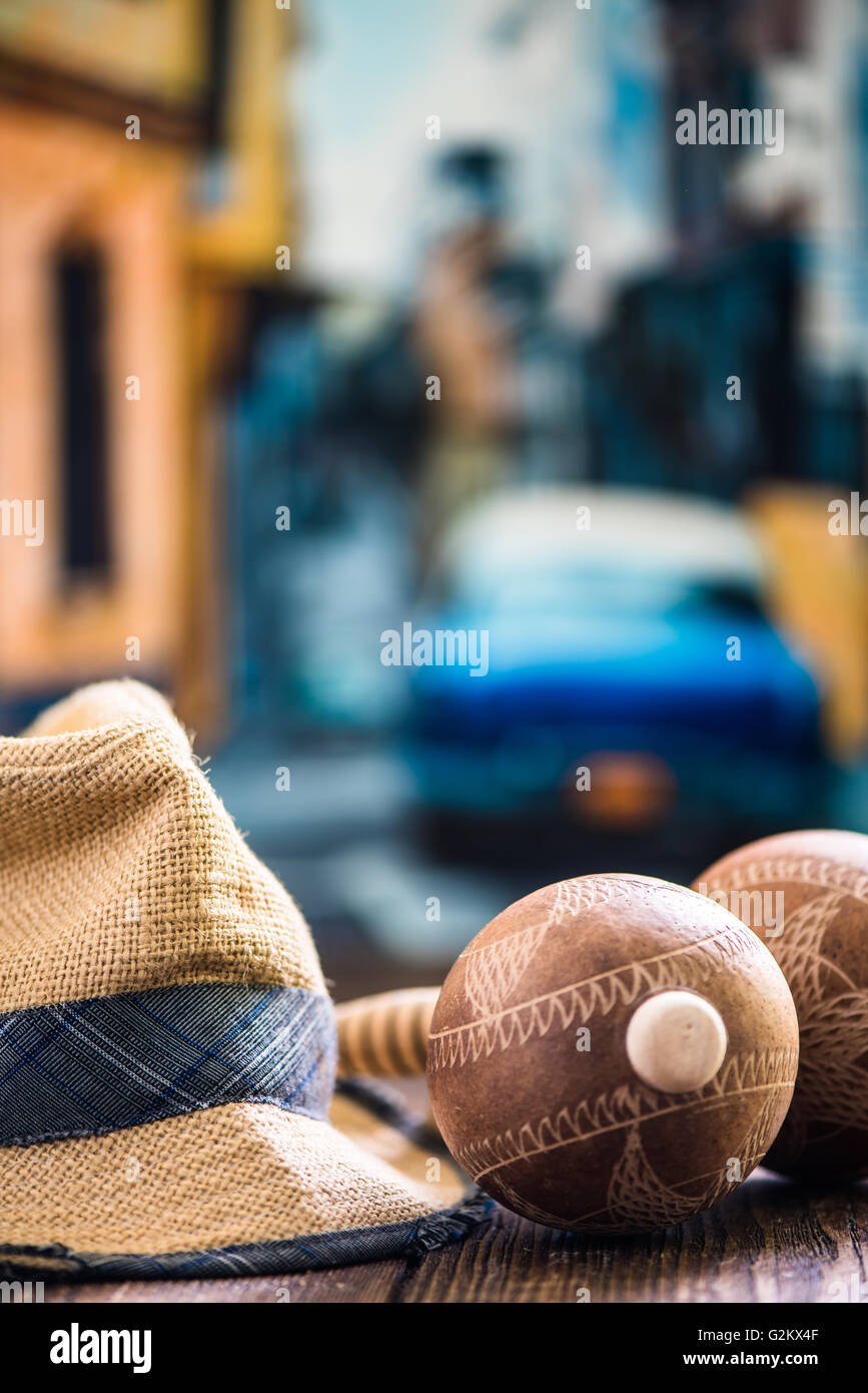 Cuban culture related items on Havana street background Stock Photo - Alamy