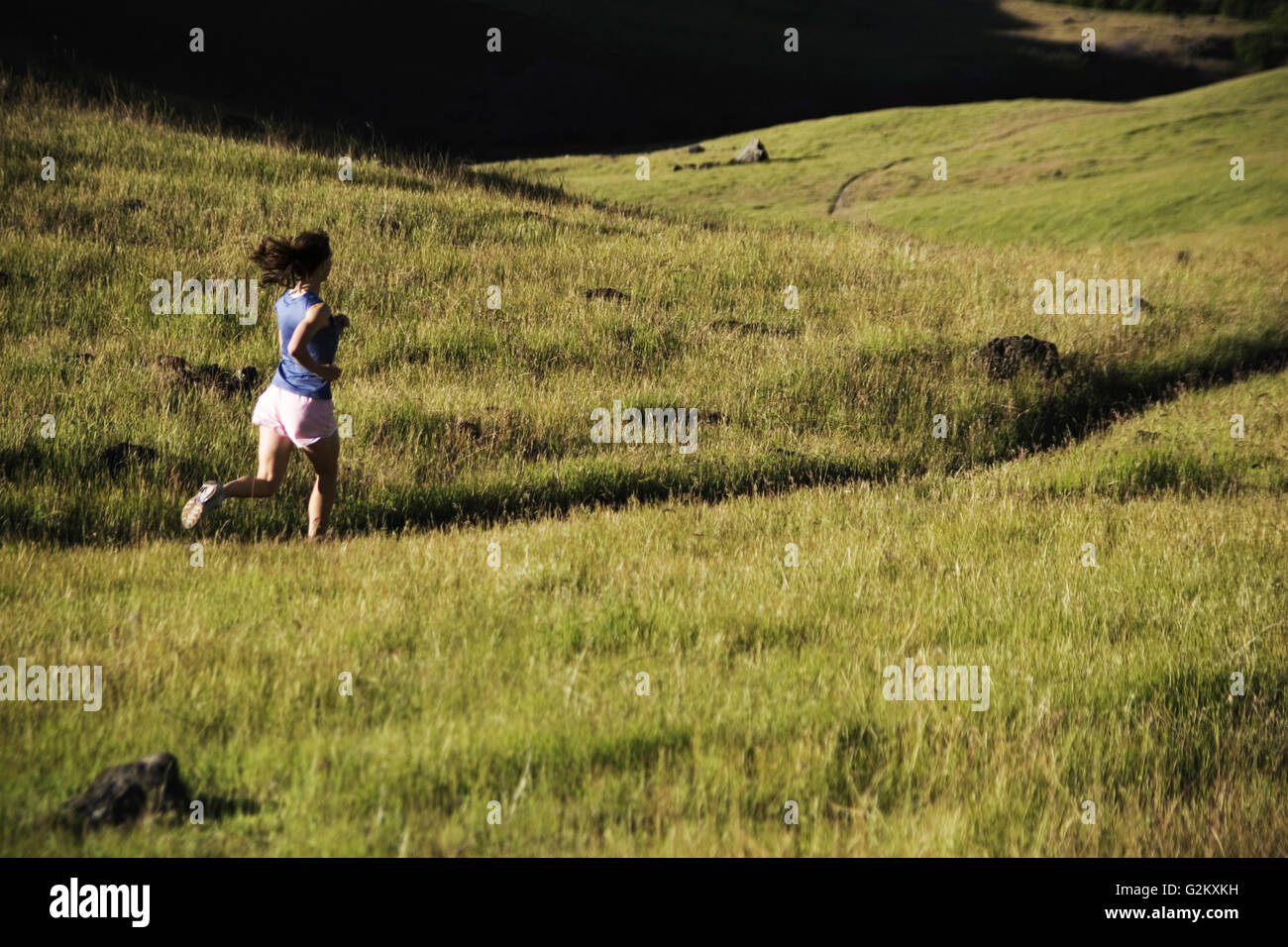 Woman Running on Path Stock Photo - Alamy