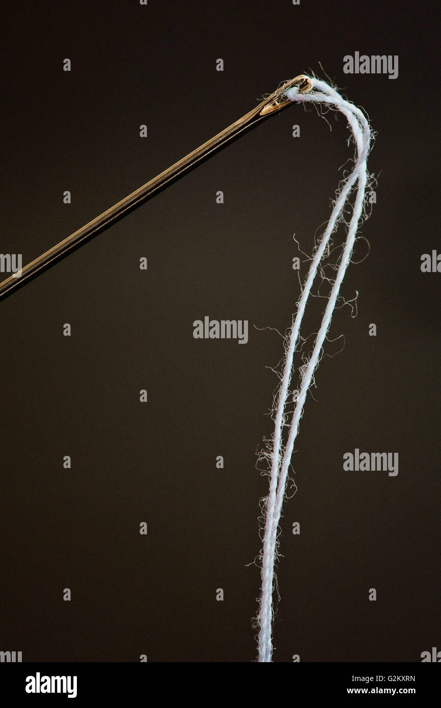 Needle and Thread, Close-Up Stock Photo - Alamy
