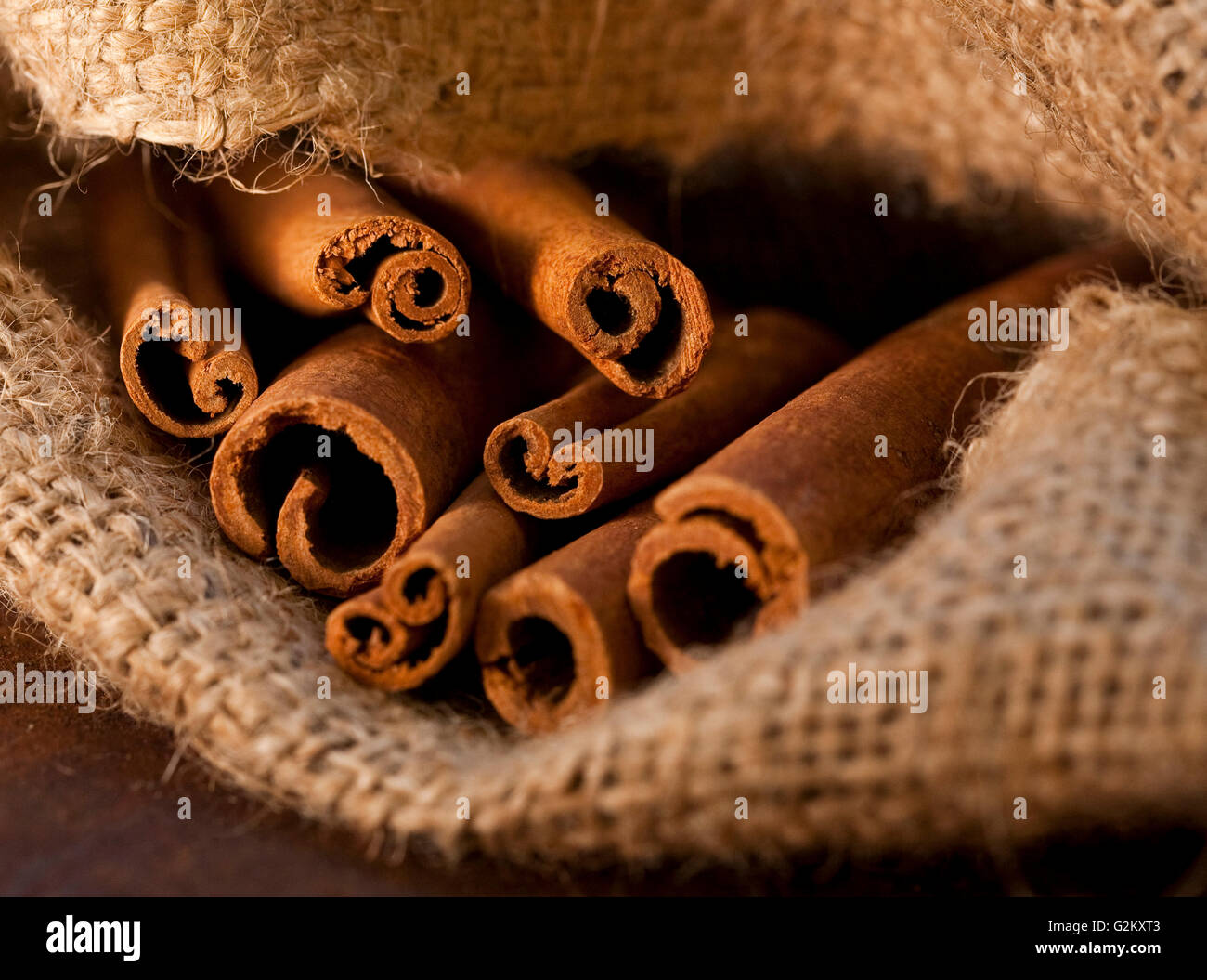 Cinnamon Sticks in Burlap Sack, Close-Up Stock Photo - Alamy
