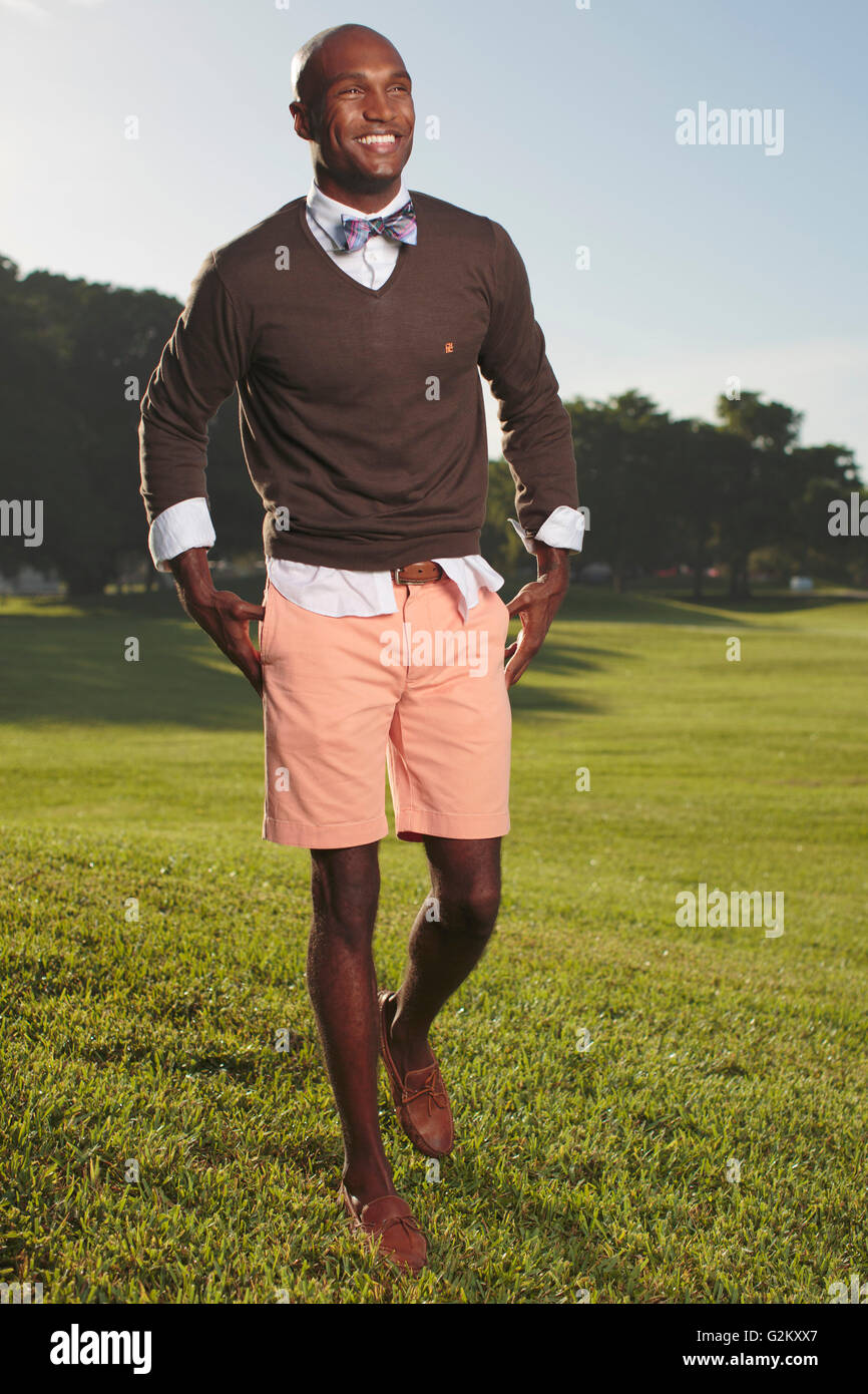 Smiling Man Walking in Park Stock Photo - Alamy