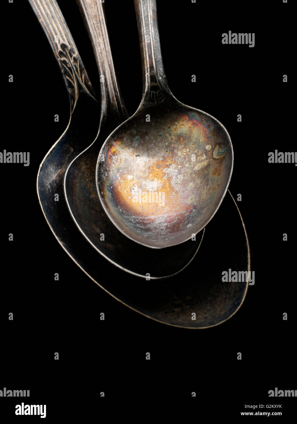 Three Tarnished Silver Spoons Stock Photo - Alamy