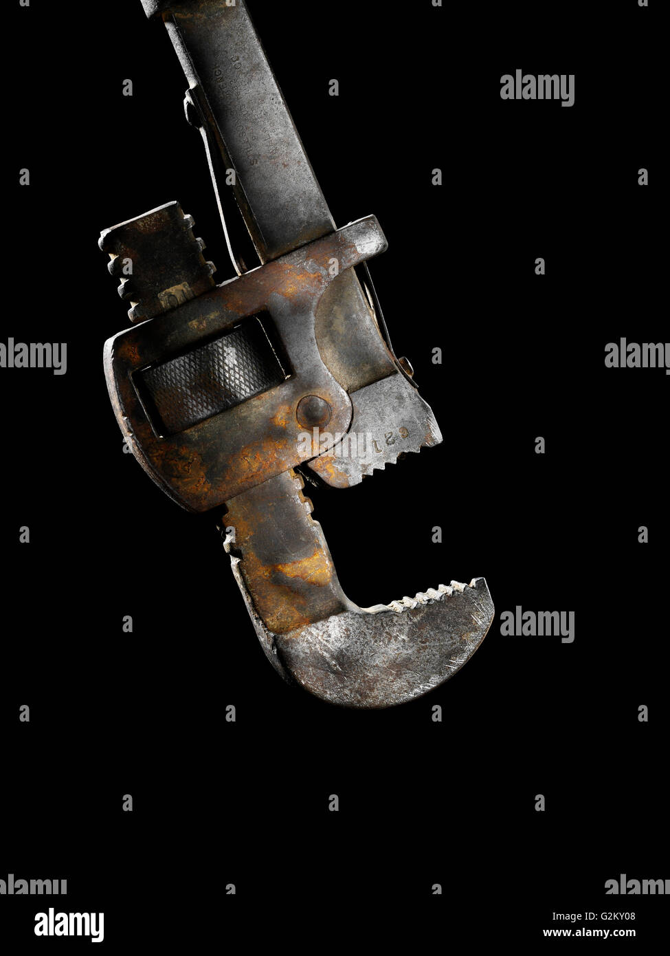 Old Pipe Wrench on Black Stock Photo - Alamy