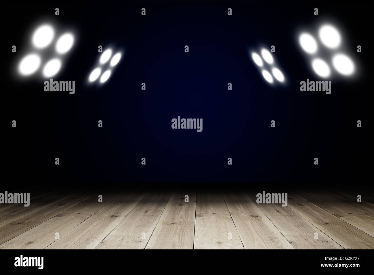 Light in dark room with wooden floor Stock Photo - Alamy