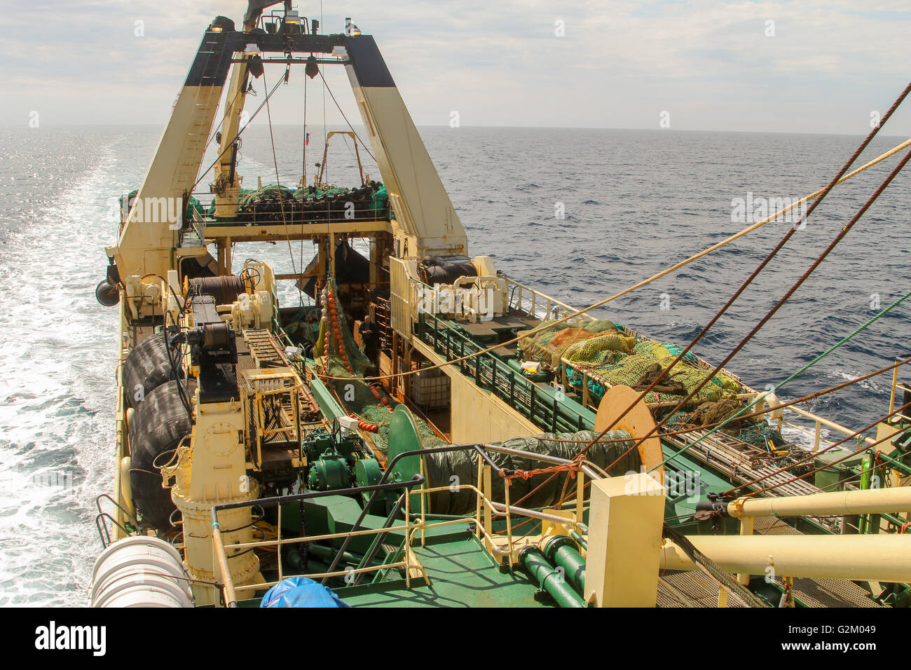 Fishing trawler in the Norvegian sea. Deck with net Stock Photo - Alamy