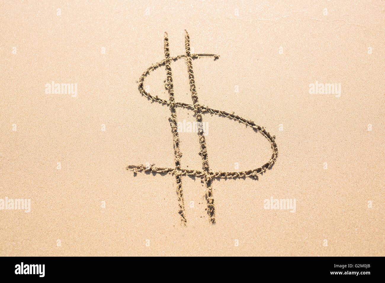 dollar sign on the beach Stock Photo - Alamy