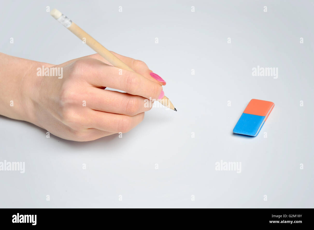 Woman hand write on table Stock Photo - Alamy
