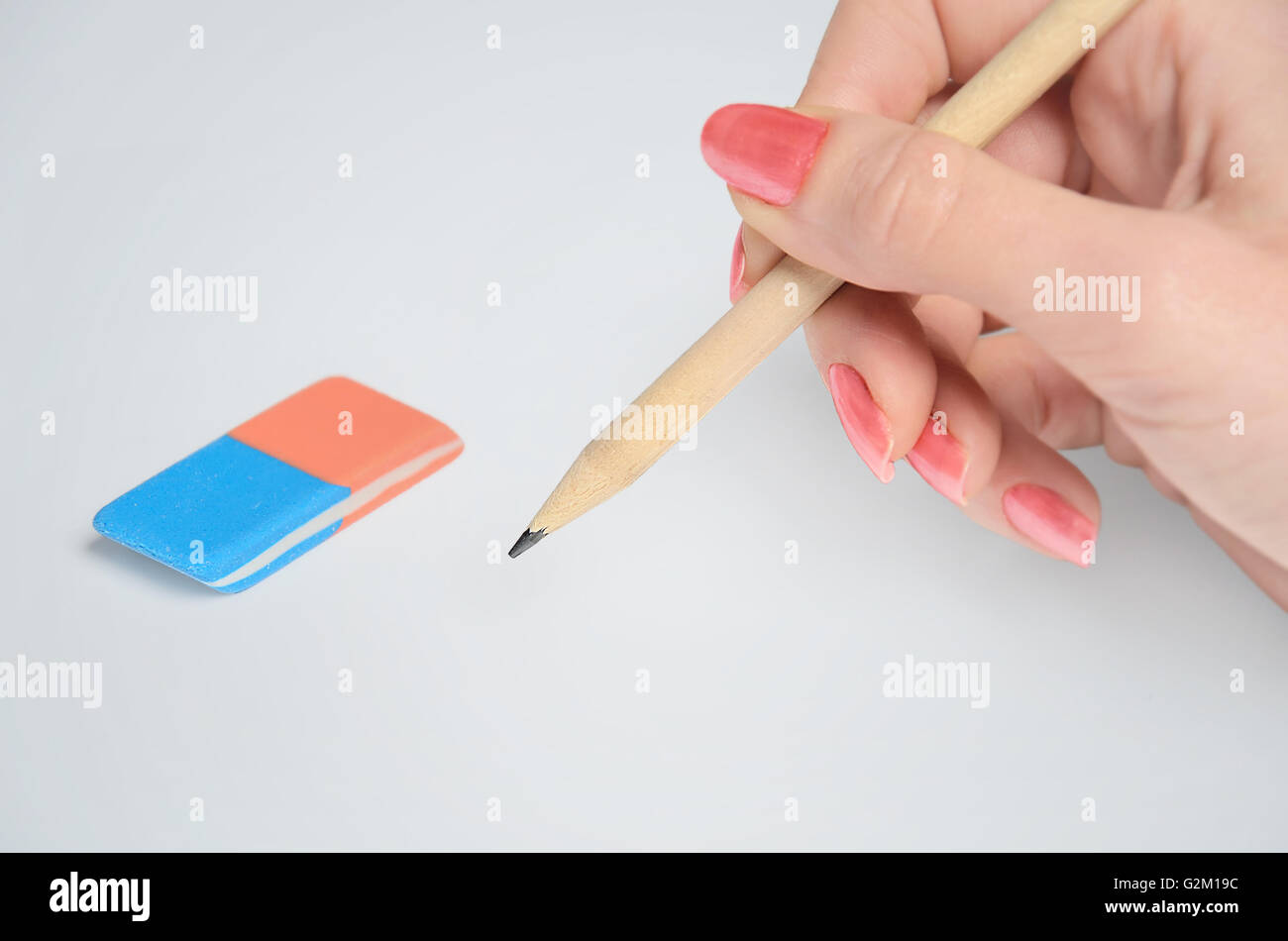 Woman hand write on table Stock Photo - Alamy