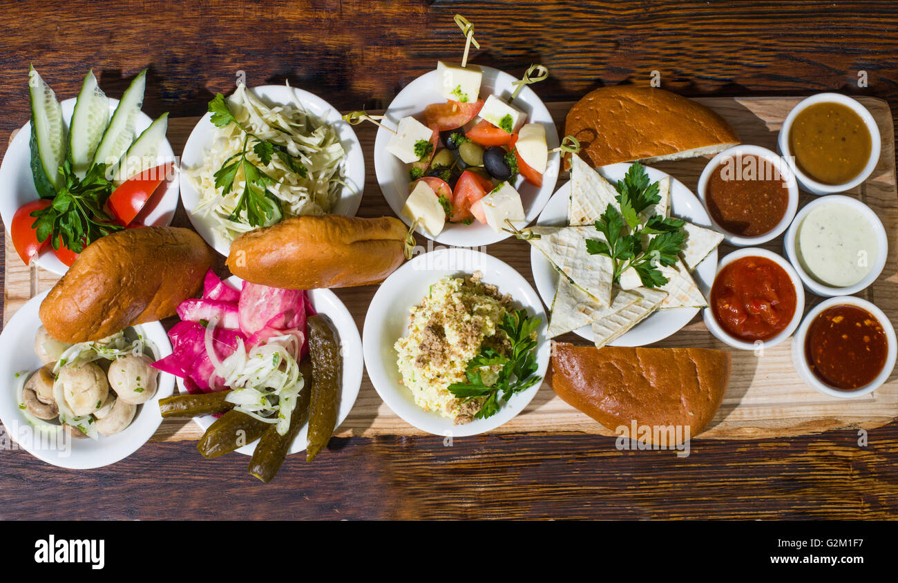 Food-desk with various snacks Stock Photo - Alamy