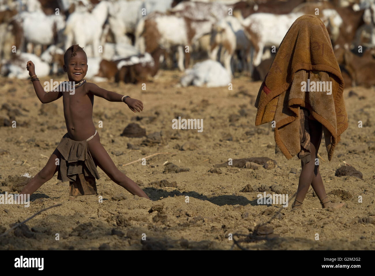 Himba boys having fun Stock Photo - Alamy