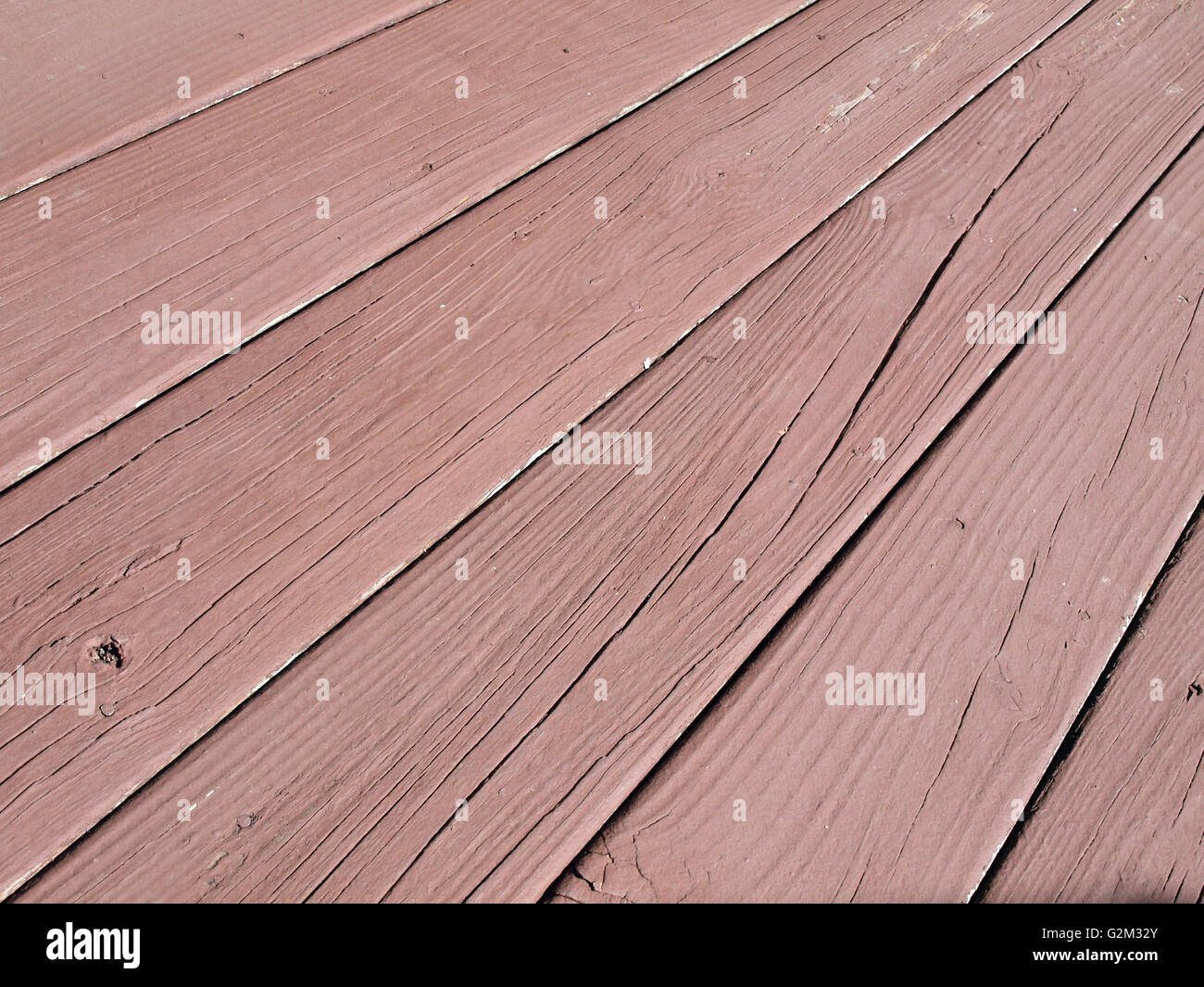 close up photo of weather beaten painted old wood beams of a deck Stock ...
