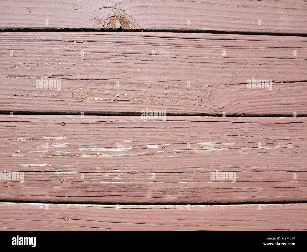 close up photo of weather beaten painted old wood beams of a deck Stock ...
