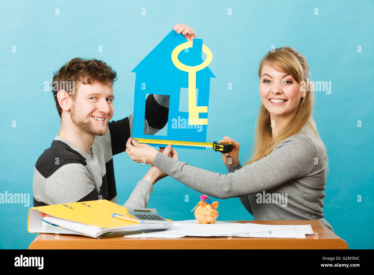 Project and design concept. Couple young marriage with model of their ...