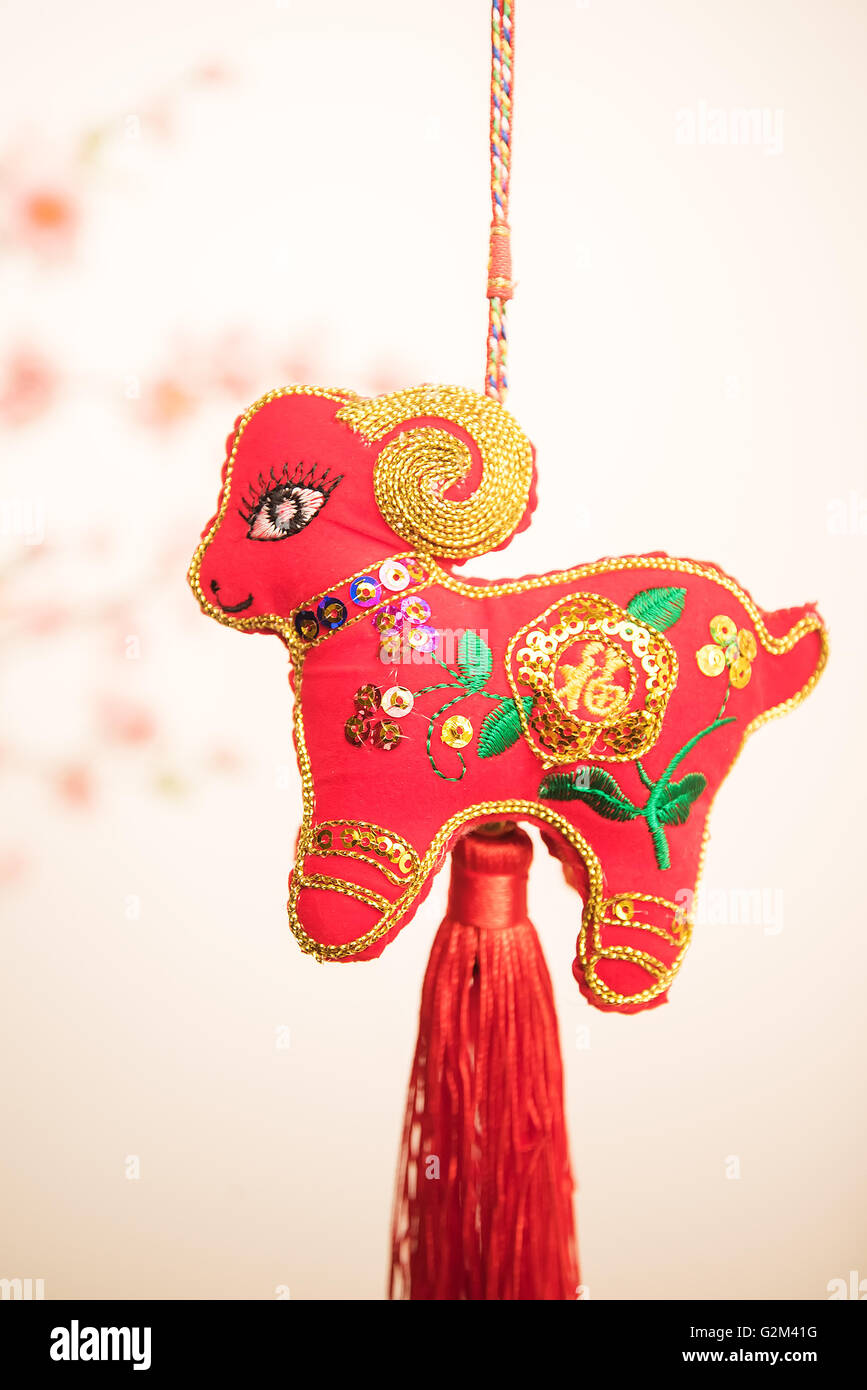 chinese goat knot on white background, word for "goat", 2015 is year of ...