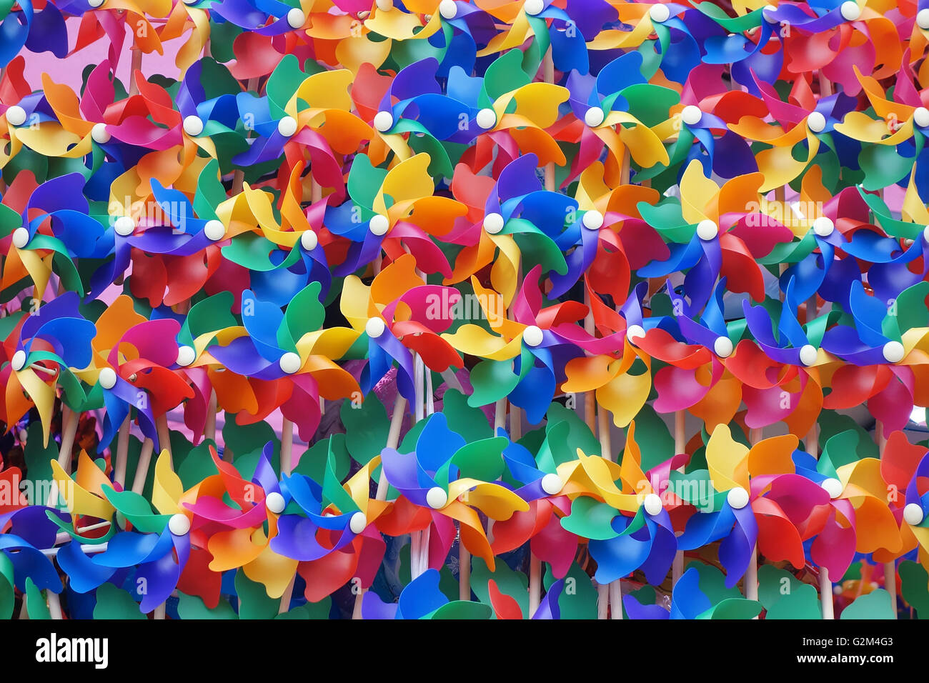 Colorful toy small windmill Stock Photo - Alamy