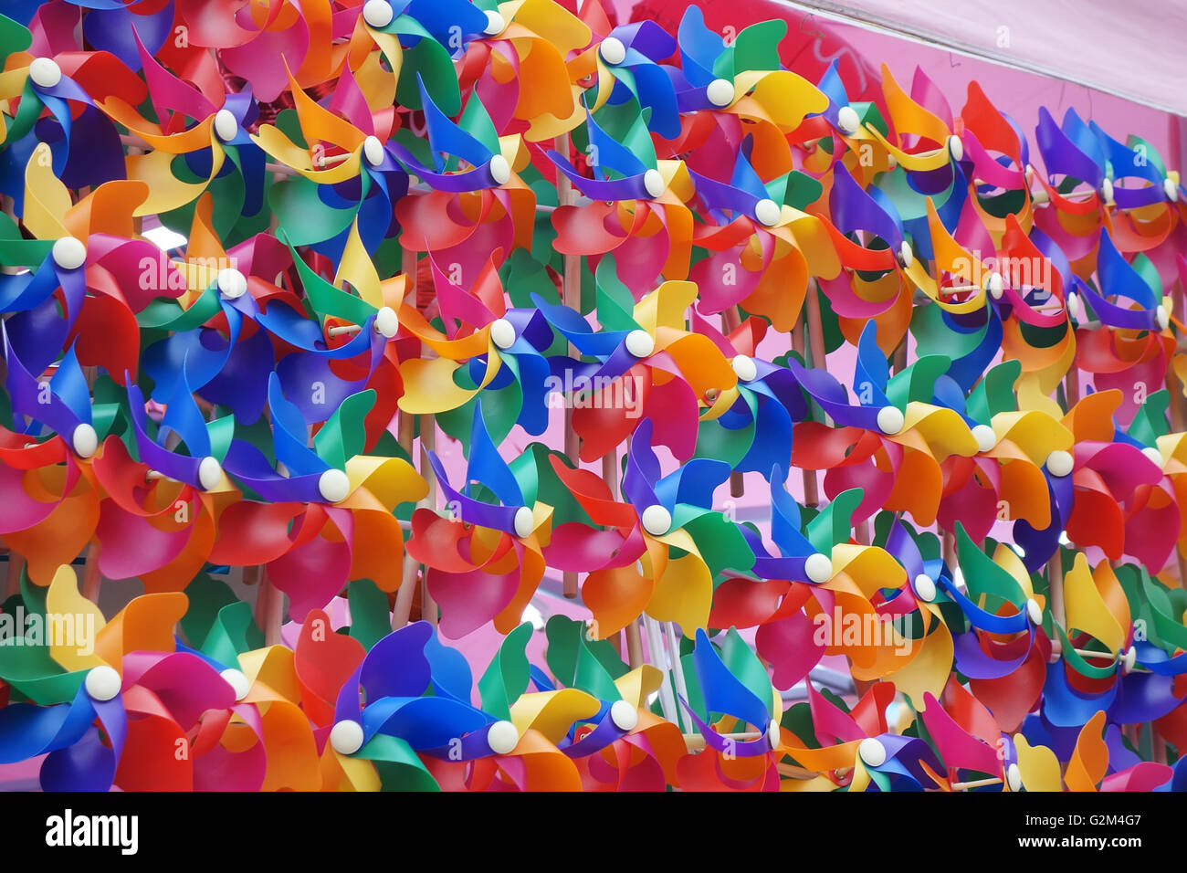 Colorful toy small windmill Stock Photo - Alamy