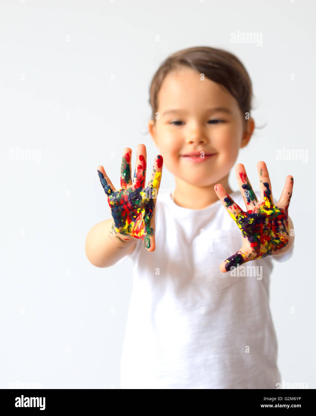 little child hands painted in colorful paints Stock Photo - Alamy