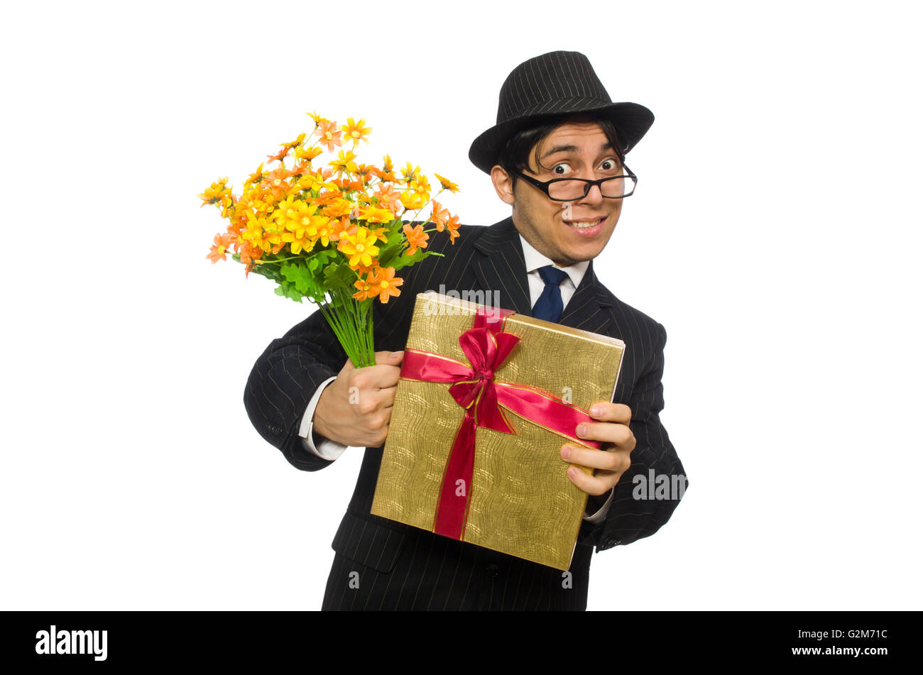 Funny man with flowers and giftbox Stock Photo - Alamy